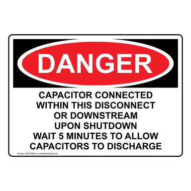 capacitor sign