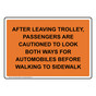 Traffic Safety Sign - After Leaving Trolley, Passengers Are Cautioned